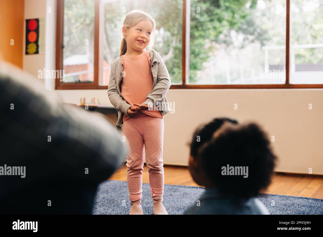 Shy child classroom hi-res stock photography and images - Alamy
