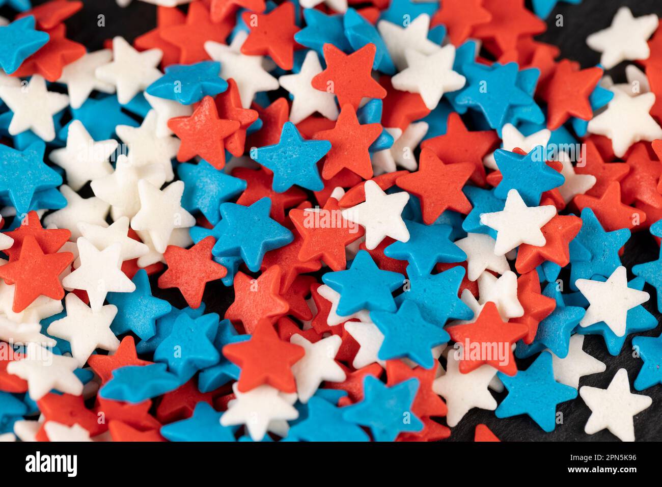 red, white and blue star-shaped candies for decorating cakes and other ...