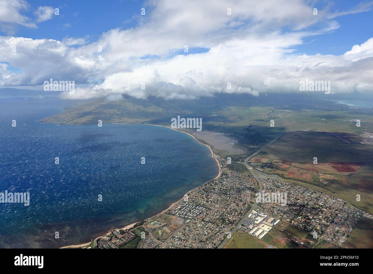 Aerial View of Maui, Hawaii: Flying over the isthmus of the island with ...