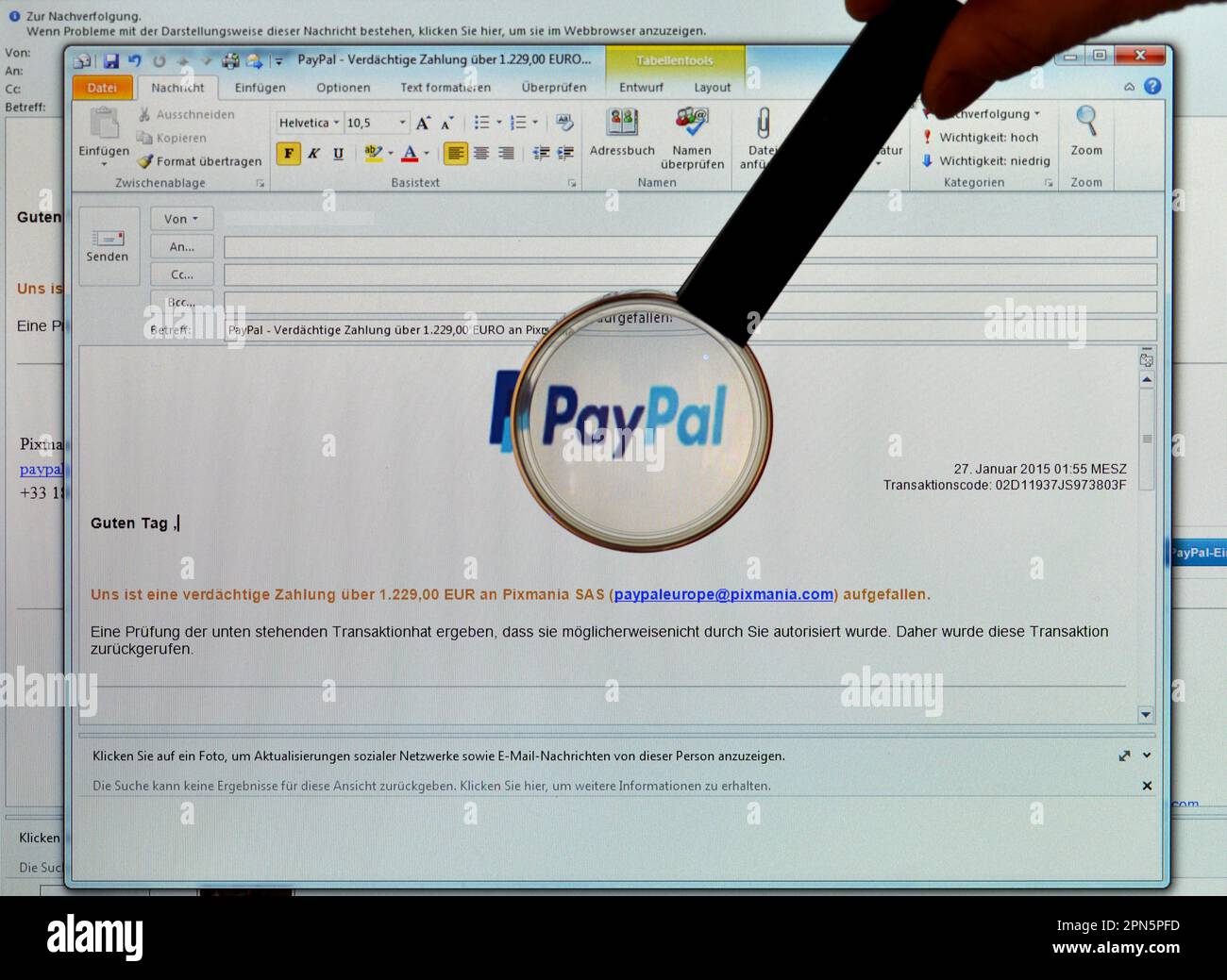 Phishing mail, magnifying glass, scam Stock Photo - Alamy