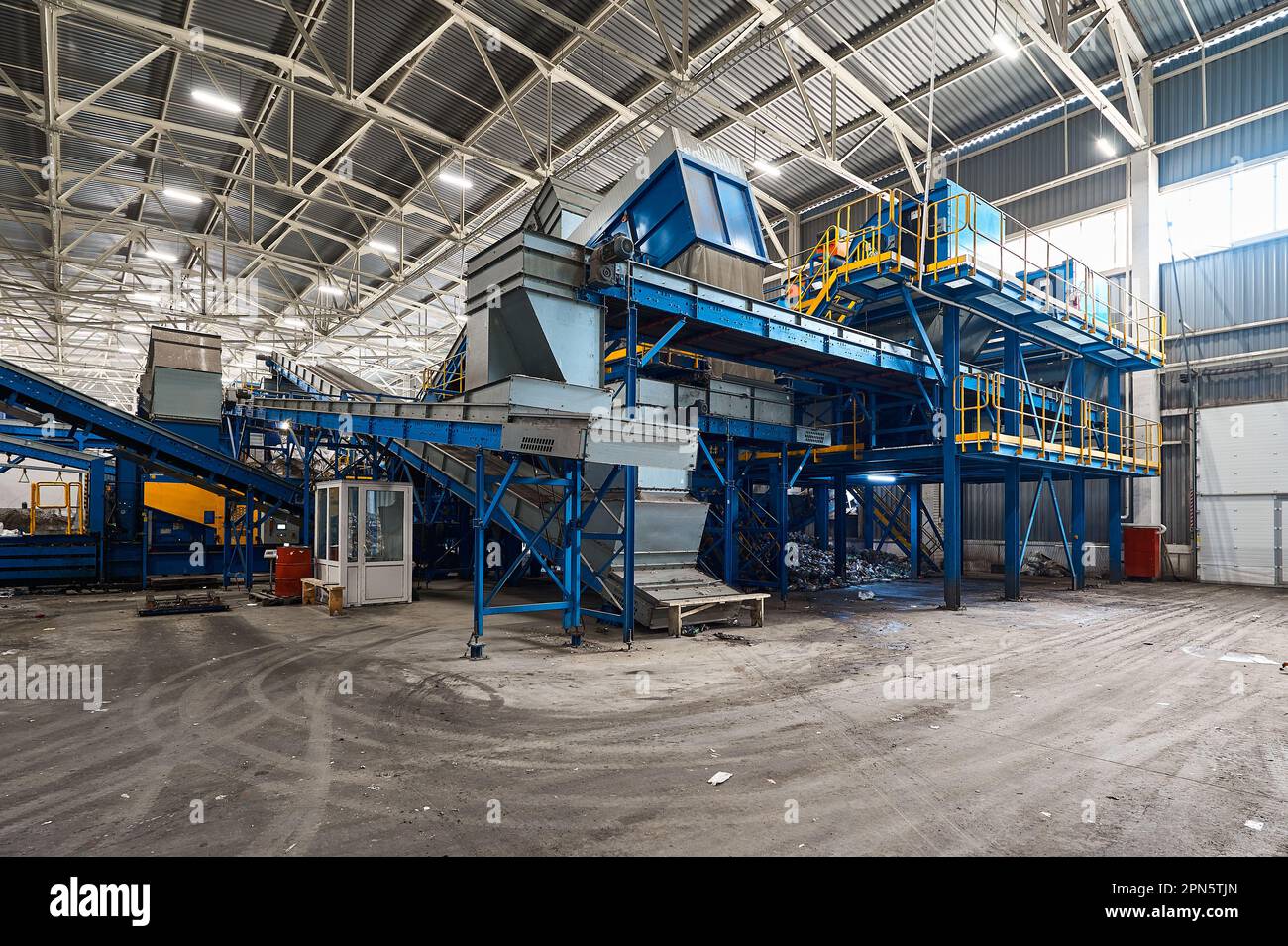 Large production line with conveyors carrying trash at plant Stock Photo - Alamy
