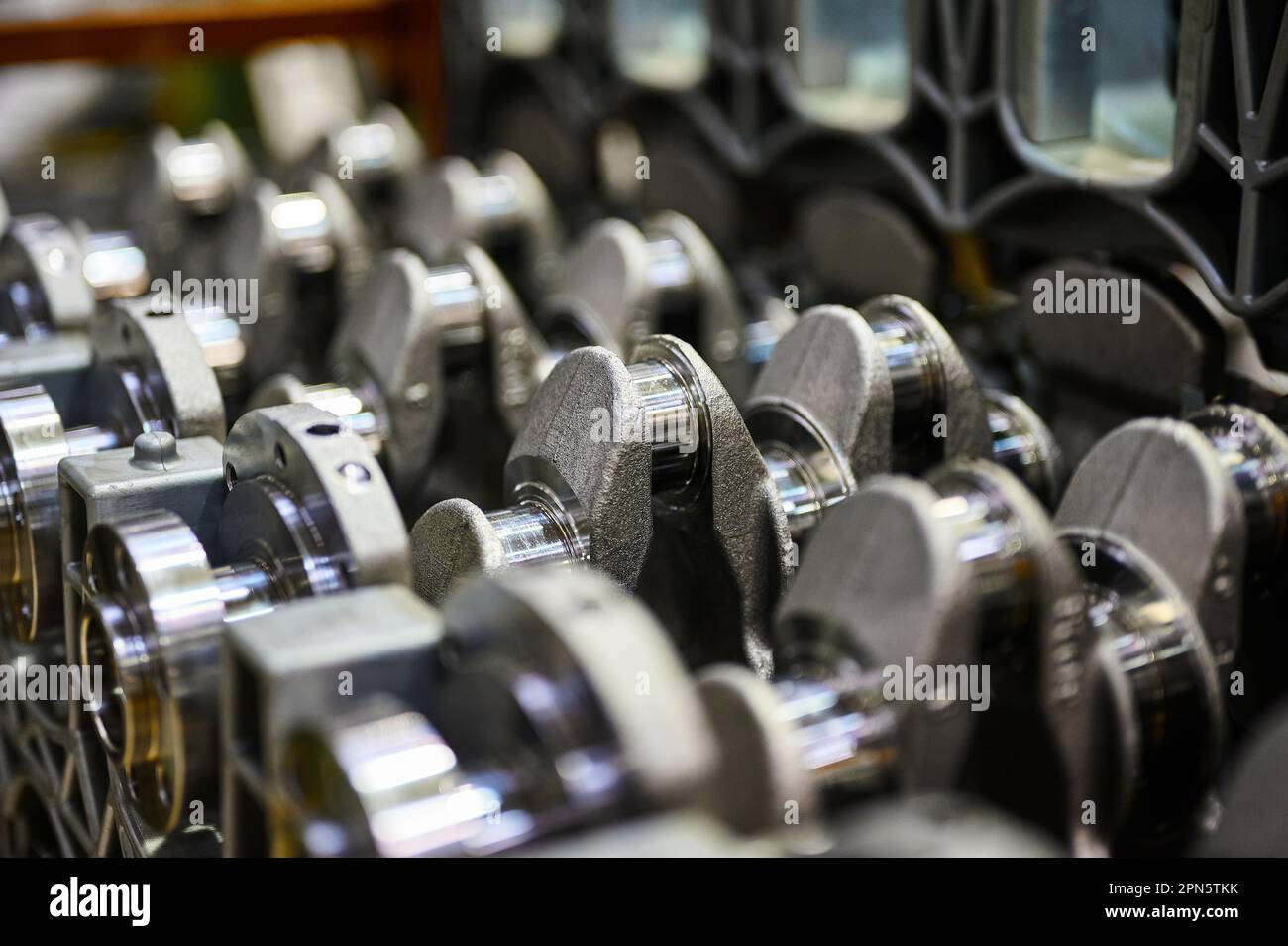 Internal combustion engine crankshafts in factory shop Stock Photo - Alamy