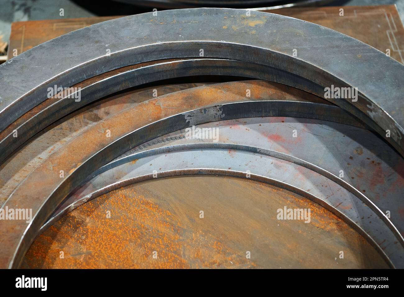 Different shape metal workpieces in production plant storage Stock ...