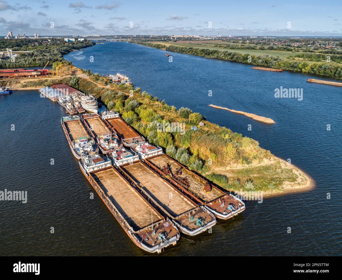 Several self-propelled barges stand at the river pier Stock Photo - Alamy