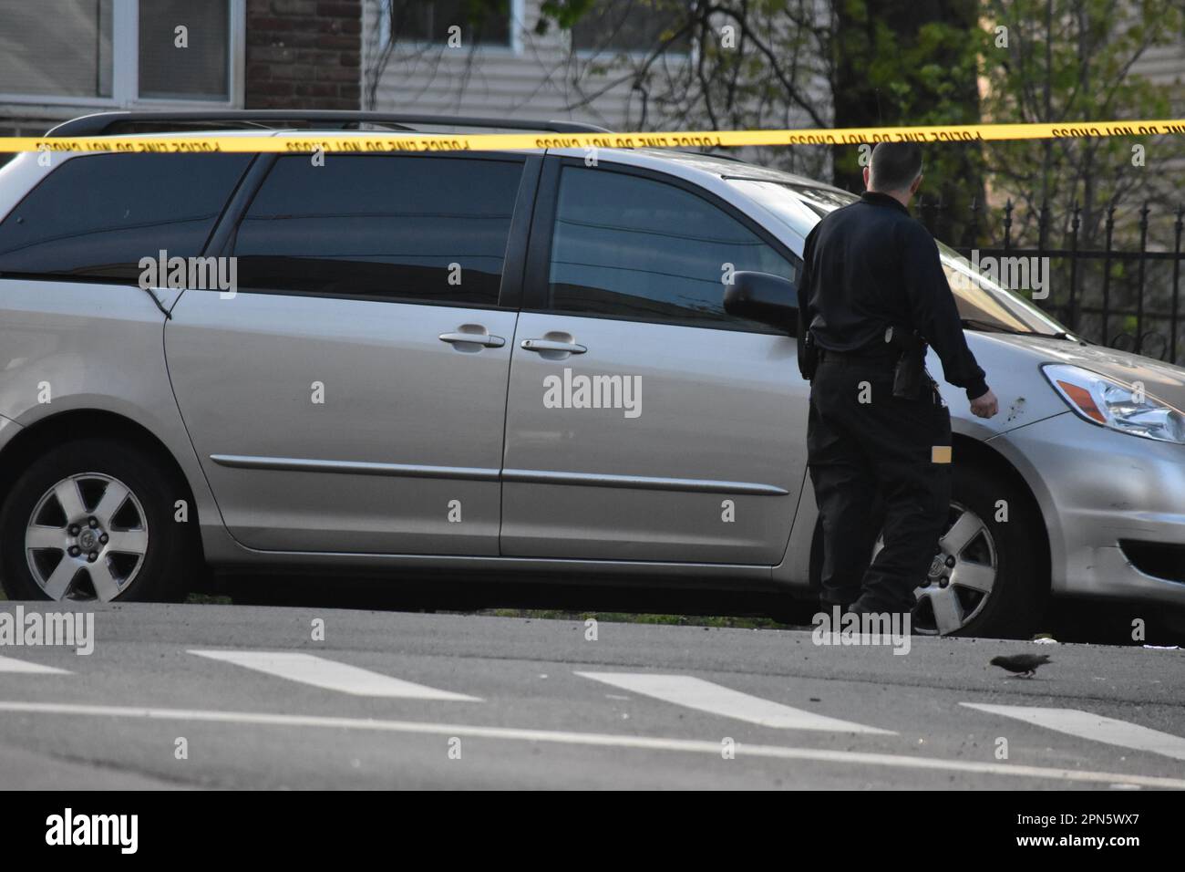 Elizabeth, United States. 16th Apr, 2023. Officers investigate the ...