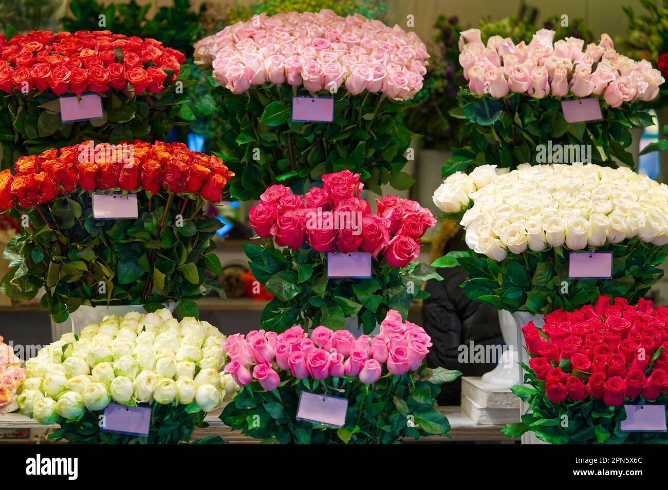 Colorful roses bouquet display in front of flower shop. Flower ...