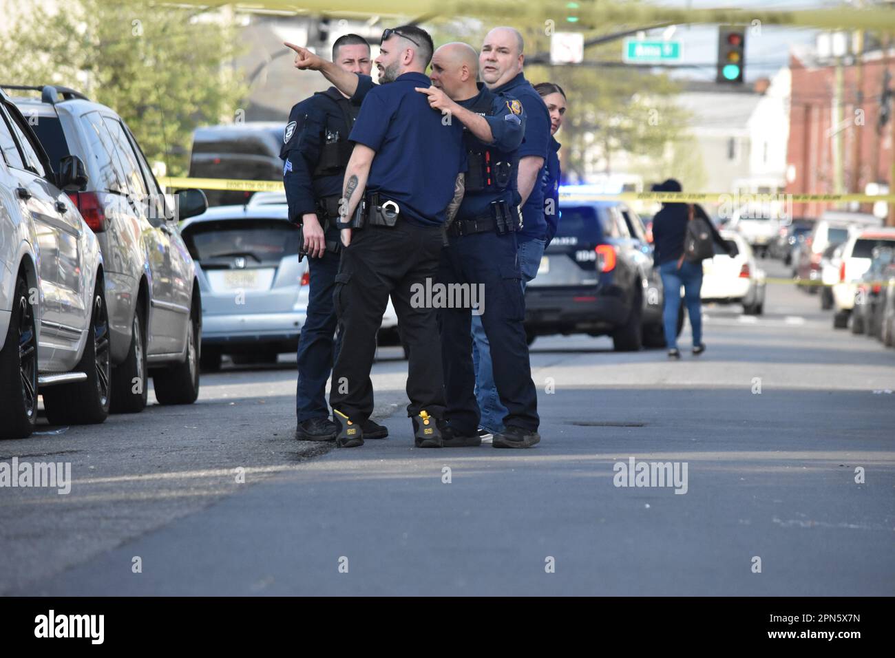 Elizabeth, United States. 16th Apr, 2023. Officers investigate the ...