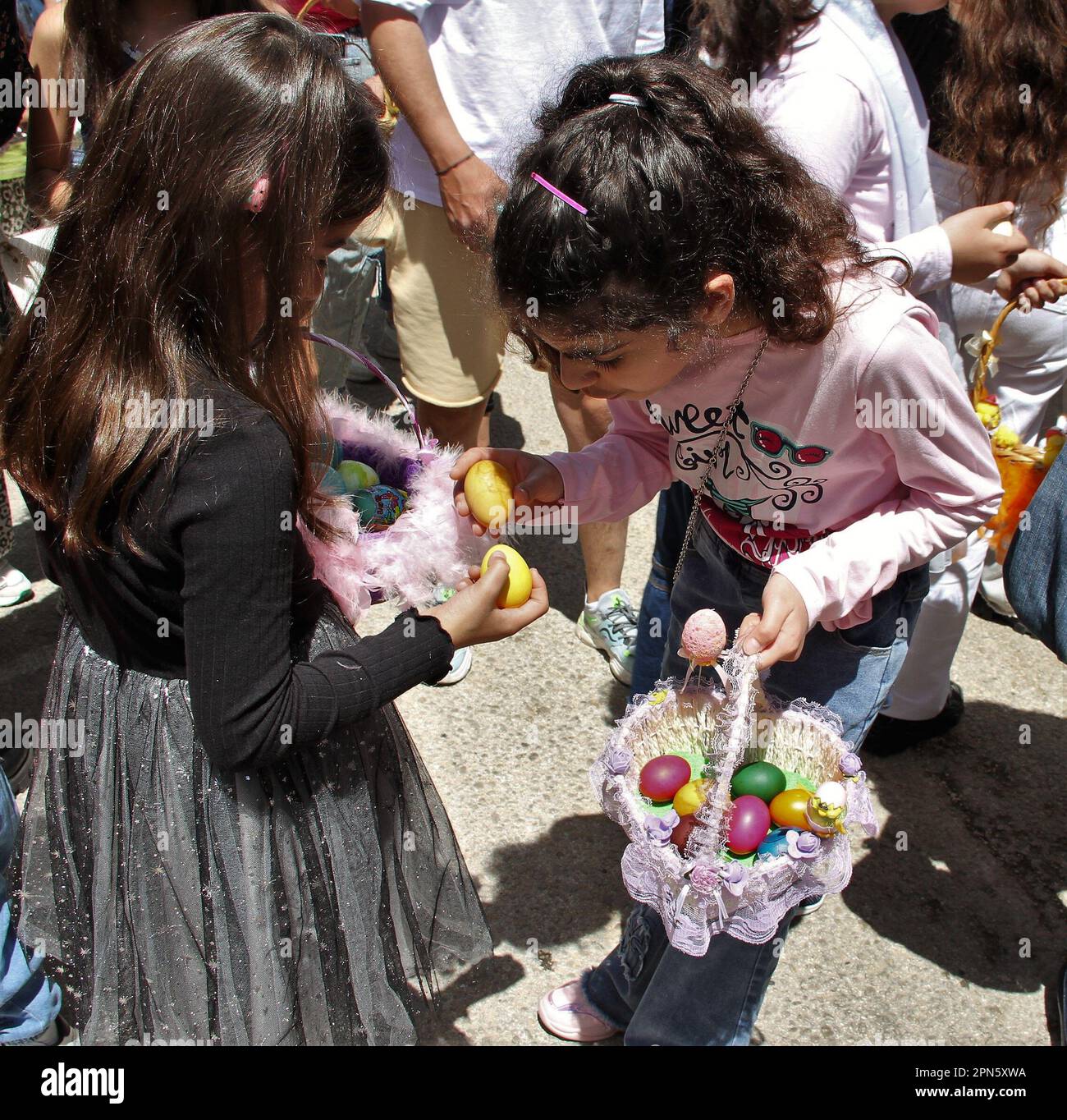 Hasbaya, Lebanon. 16th Apr, 2023. Two girls play egg tapping during the ...