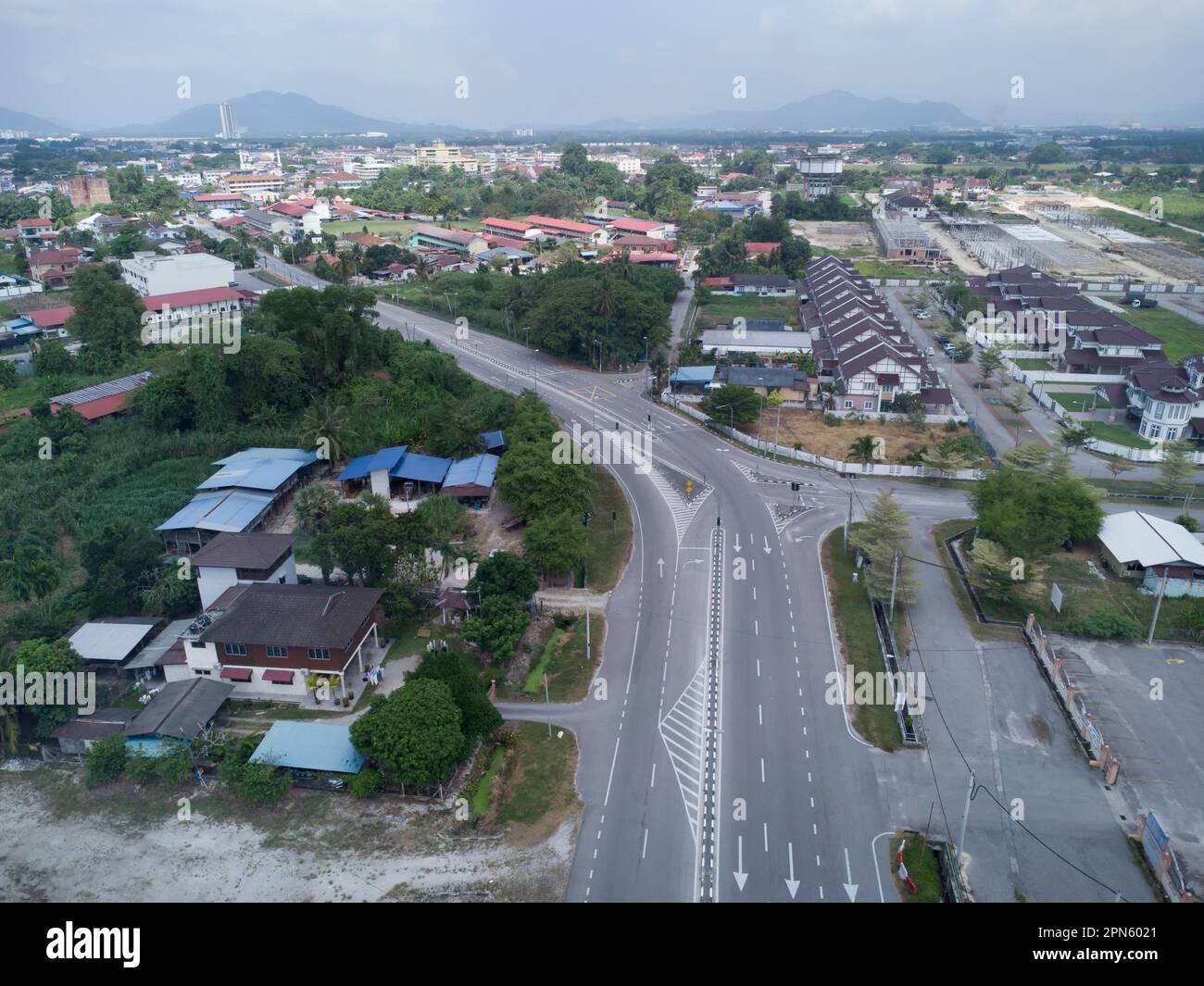 daytime aerial scene of the houses or concrete building at the suburb ...
