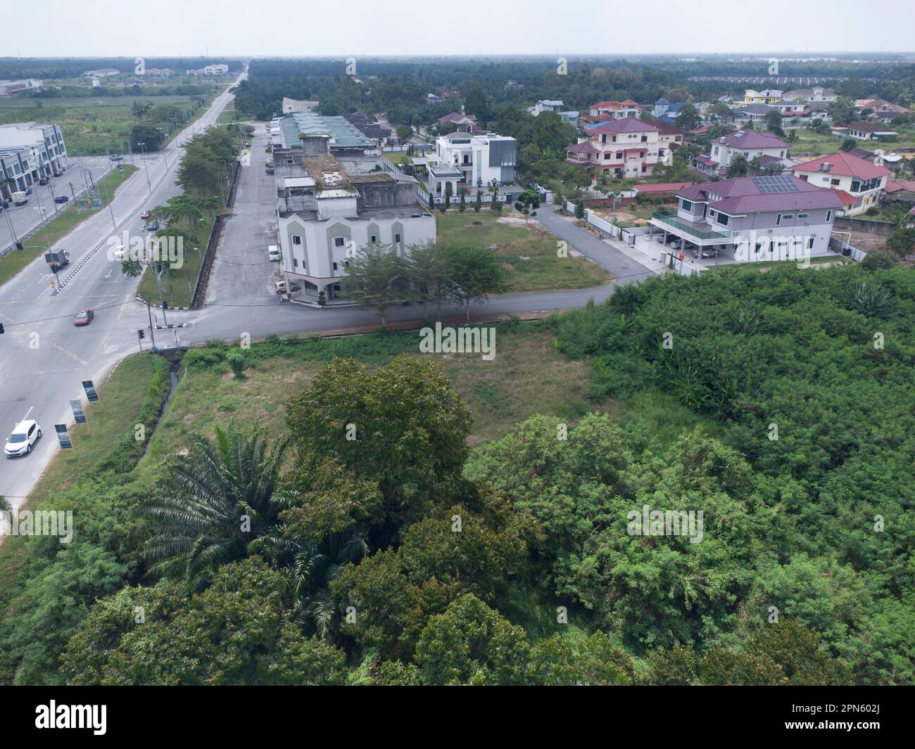 daytime aerial scene of the houses or concrete building at the suburb ...