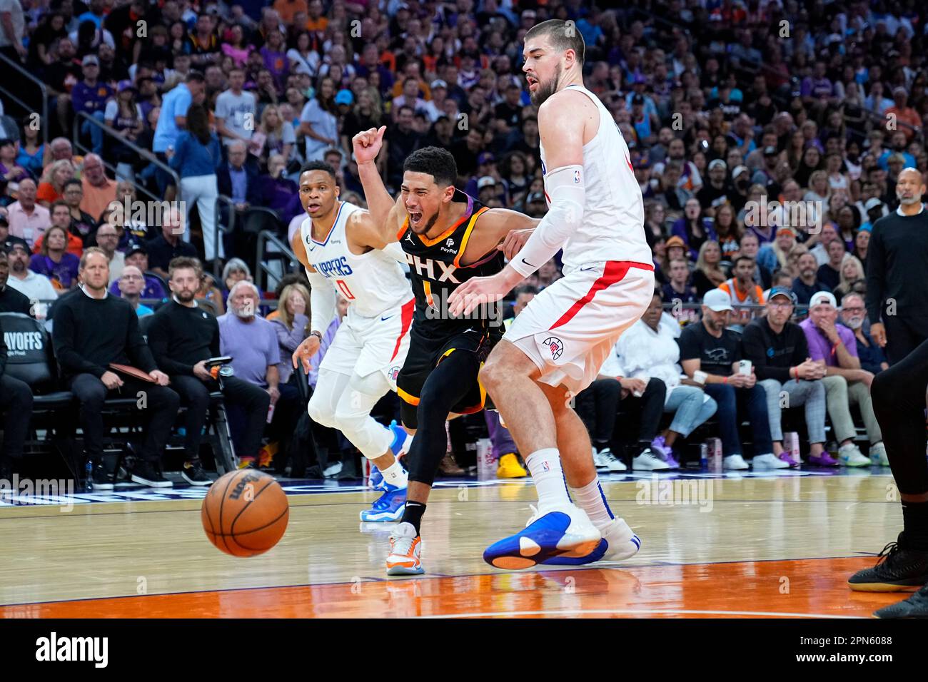 Phoenix Suns guard Devin Booker (1) is foiled by Los Angeles Clippers ...