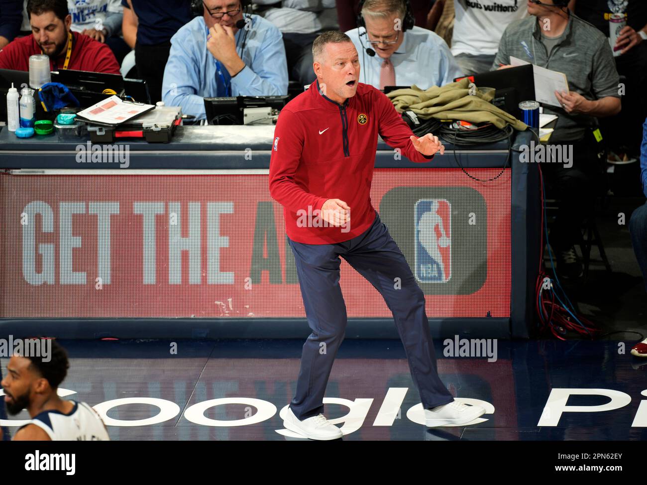 Denver Nuggets head coach Michael Malone argues for a call in the first ...