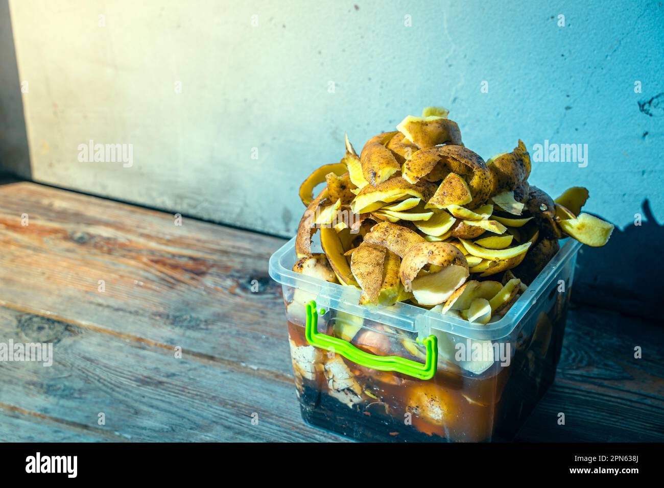 Food waste separately in a transparent plastic container. Sorted ...