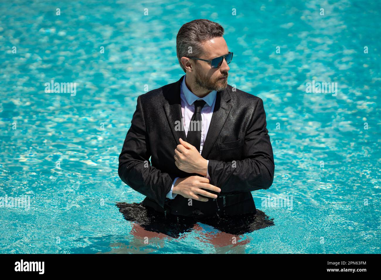 handsome businessman boss in summer pool outdoor. businessman boss in ...