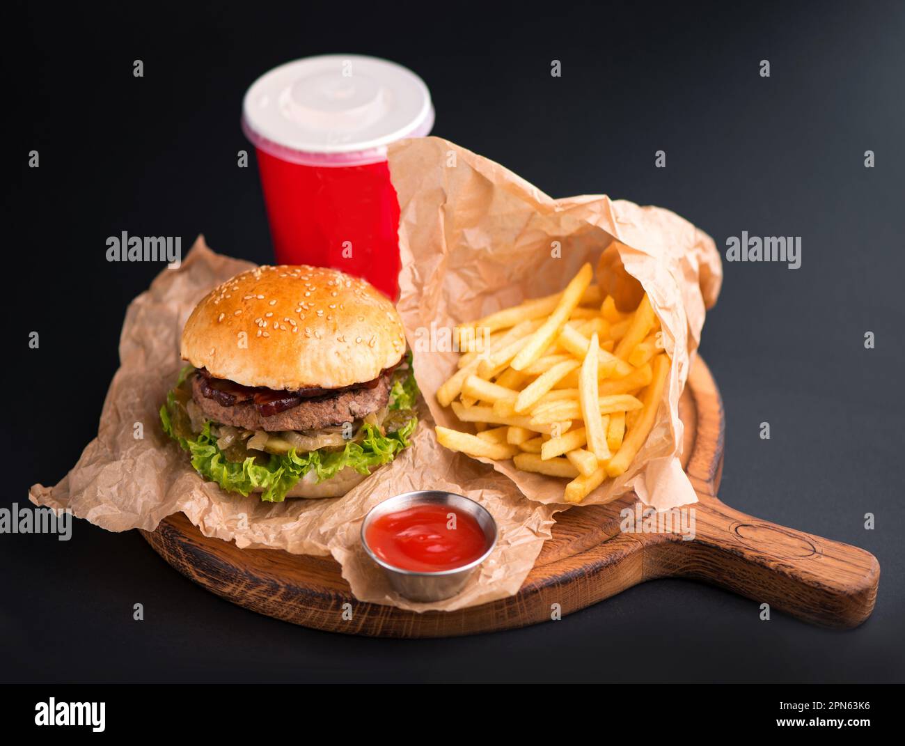 Classic burgers with becon, meat, cheese, onion, tomato and cheese and ...