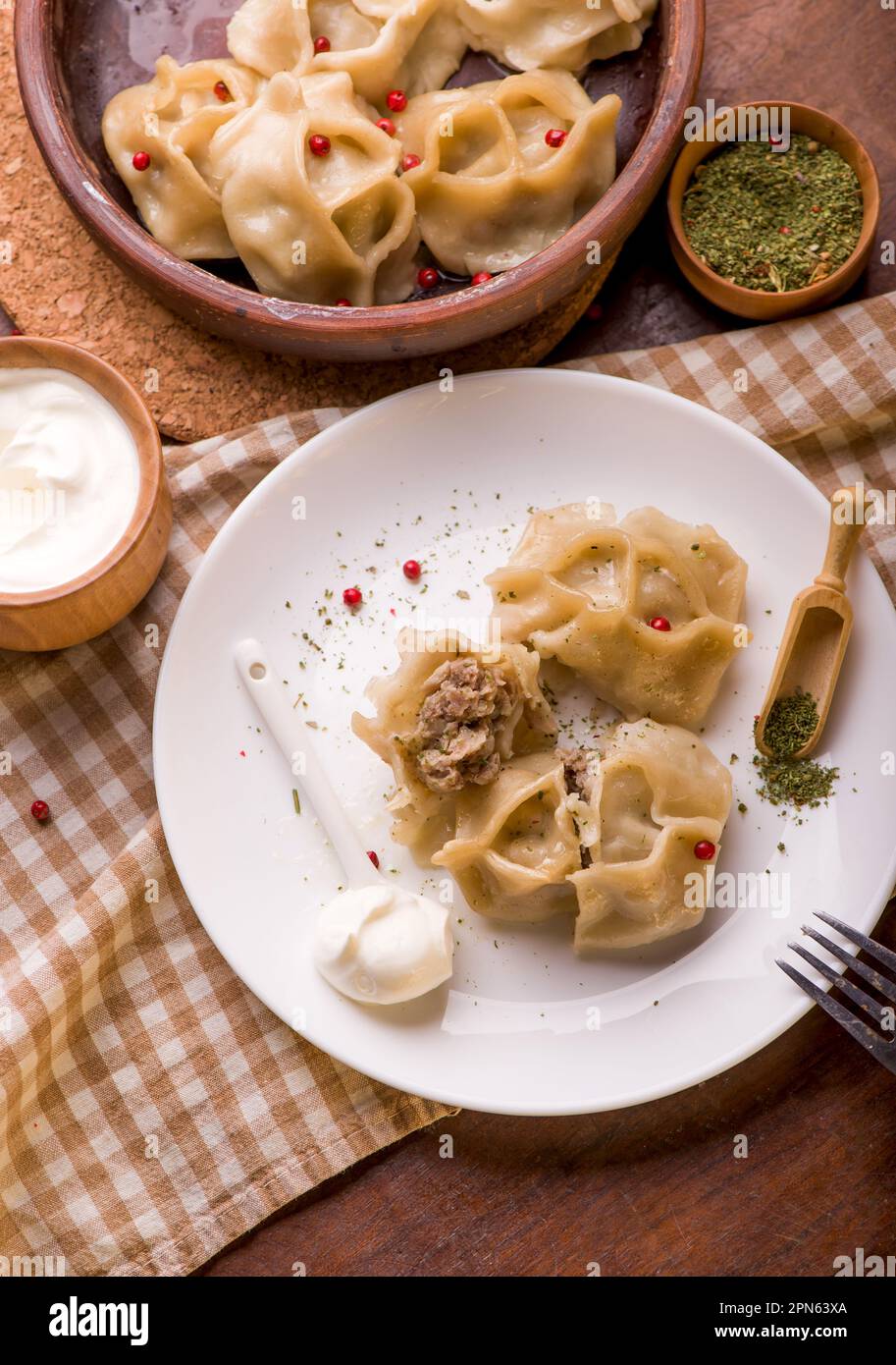 traditional Eastern dish manti or manty with beef Stock Photo - Alamy