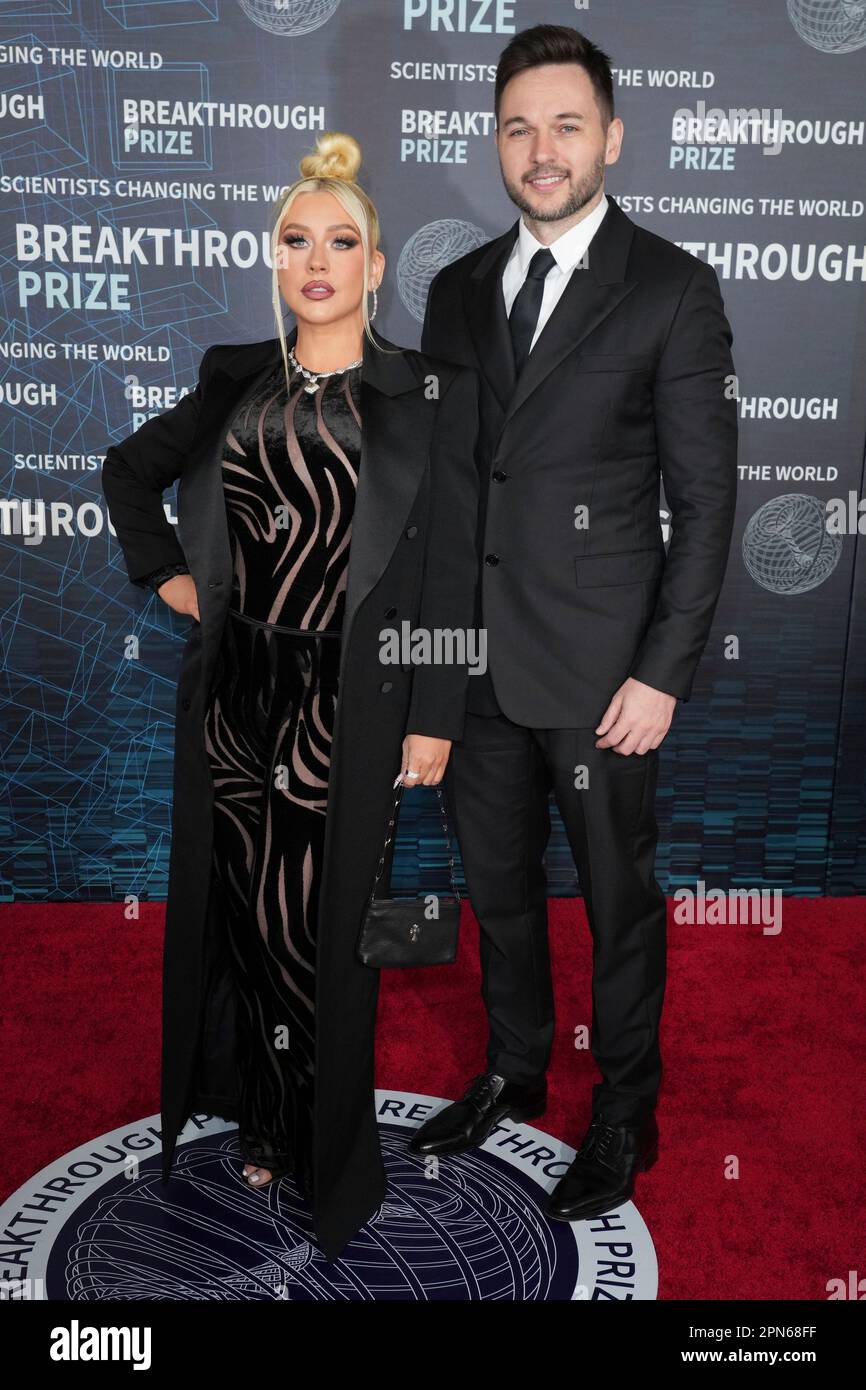 Christina Aguilera, left, and Matthew Rutler arrive at the ninth ...