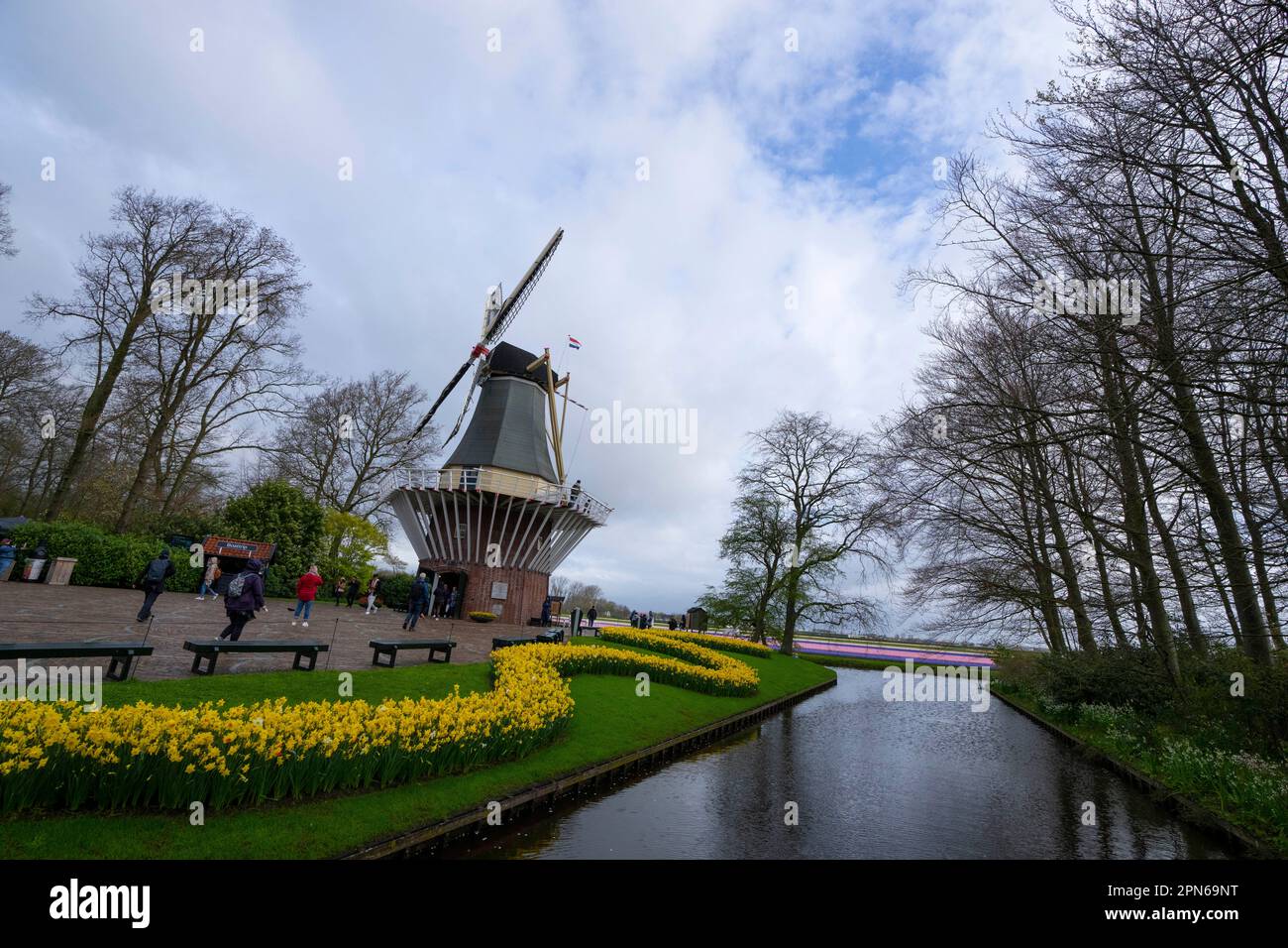 Tourists pose for pictures at the world-renowned Dutch flower garden ...