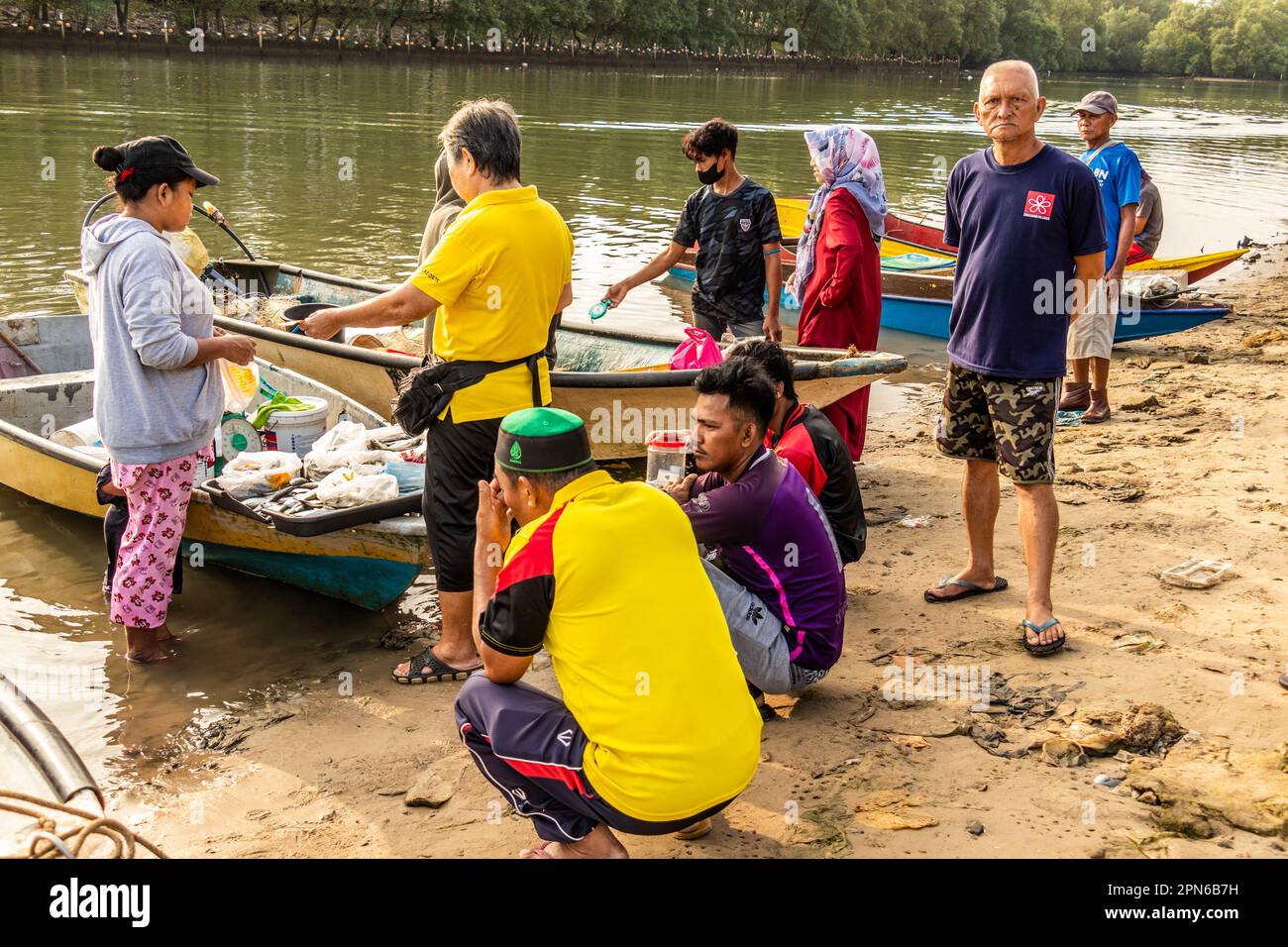 Buying and selling of fish next too Yayasan Sabah bridge Likas Bay Kota ...