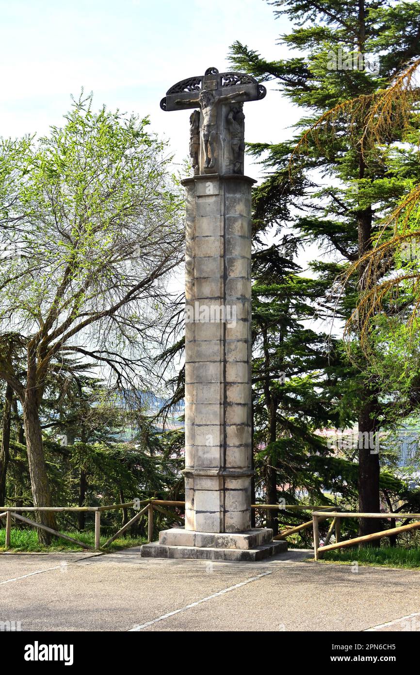 Stone crucifix next to the castle ruins in Burgos in spain Stock Photo ...