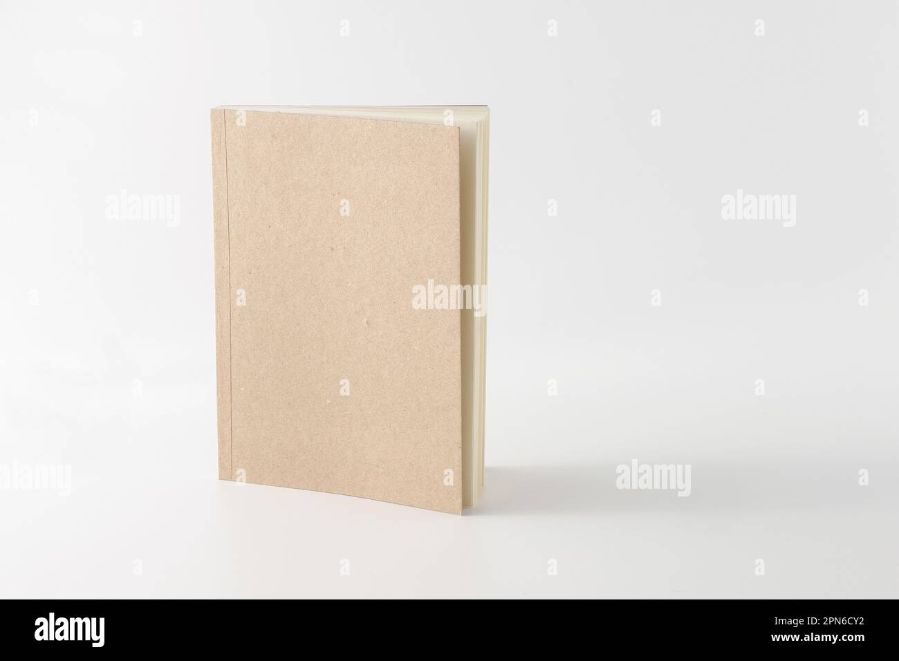 Recycled paper book on white background Stock Photo - Alamy