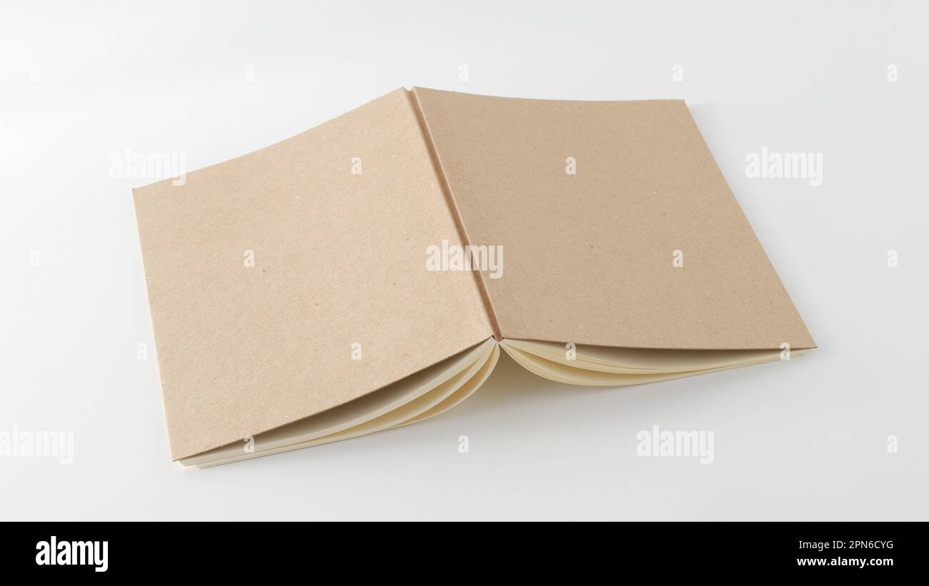Recycled paper book on white background Stock Photo - Alamy
