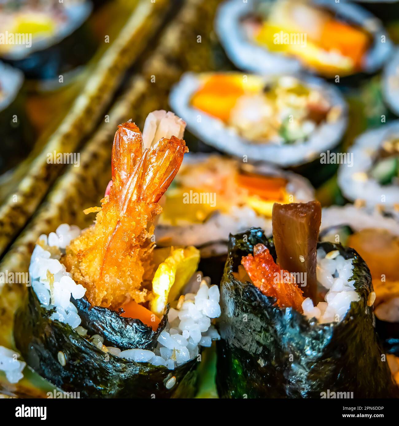 Gimbap is a Korean dish made from cooked rice and ingredients such as ...