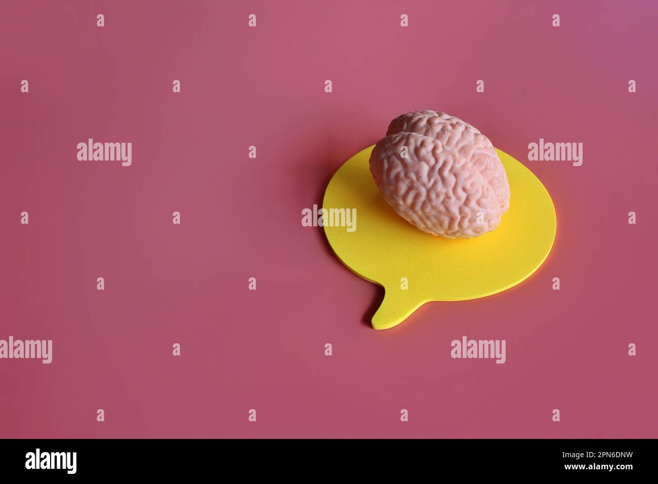 Speech bubble and brain model with copy space. Speak your mind ...