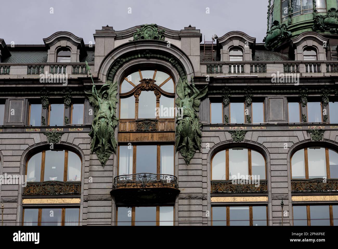 Sculptures on the facade of Singer House, Saint Petersburg. Old ...