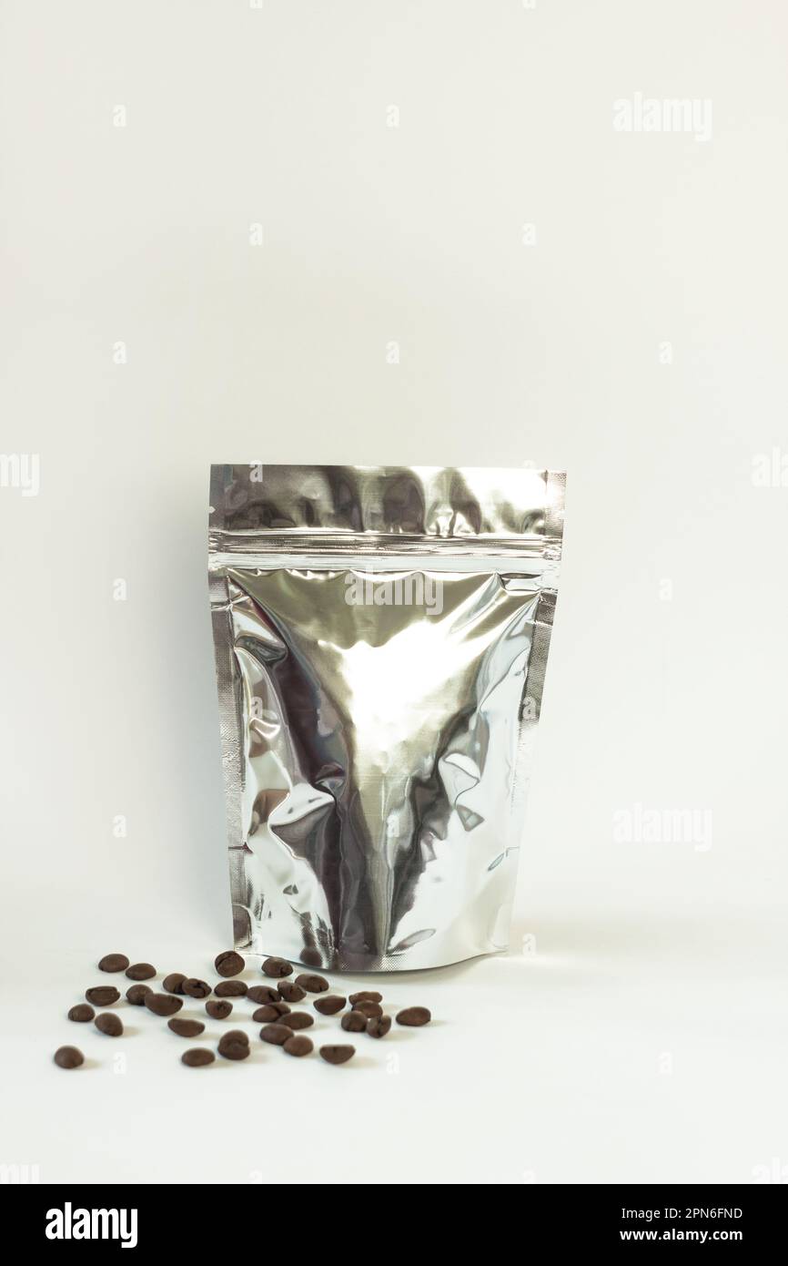 Silver metallized foil pouch bag with window isolated on white ...