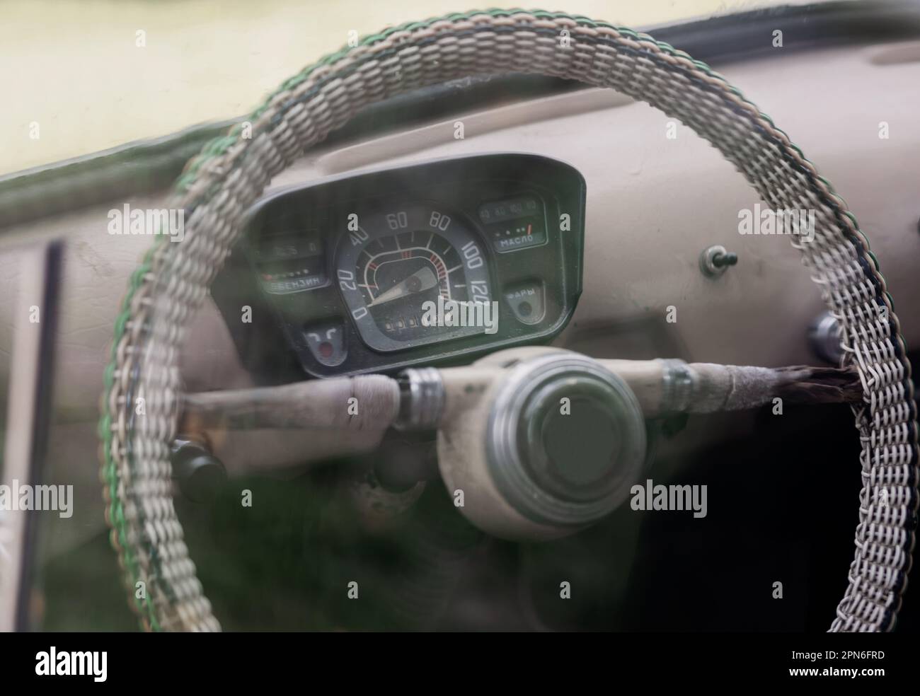 Retro car, vintage steering wheel, speedometer. Interior of a classic ...