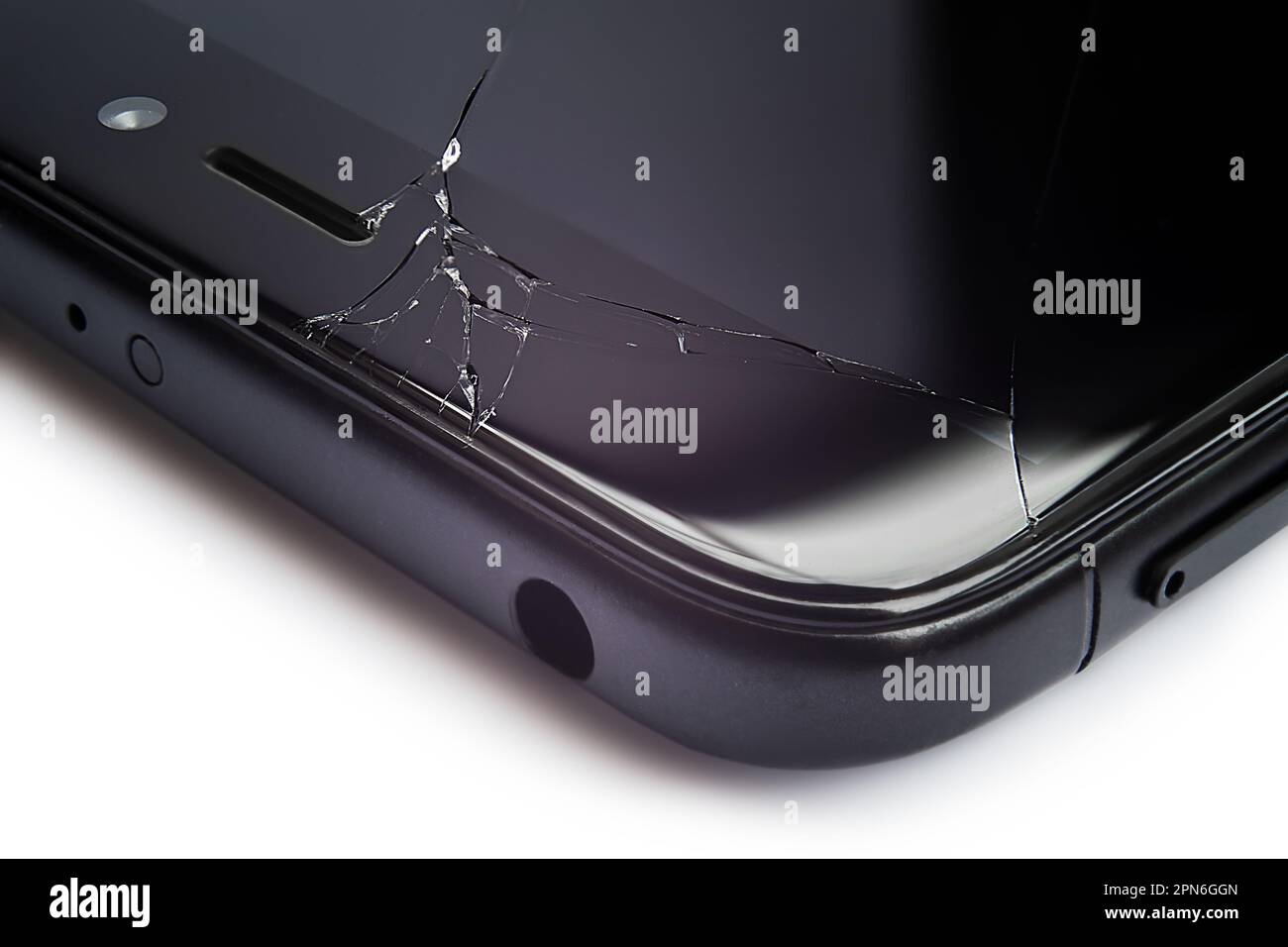 Close-up of a smartphone with a broken display, isolated on a white ...