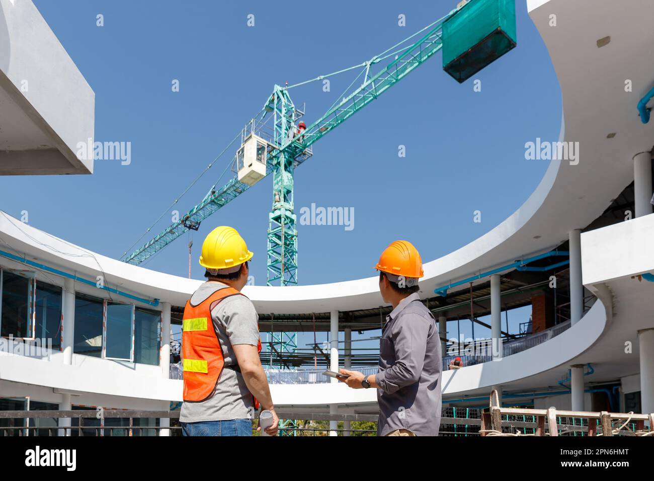 Construction concept of Engineer and Architect working with ...