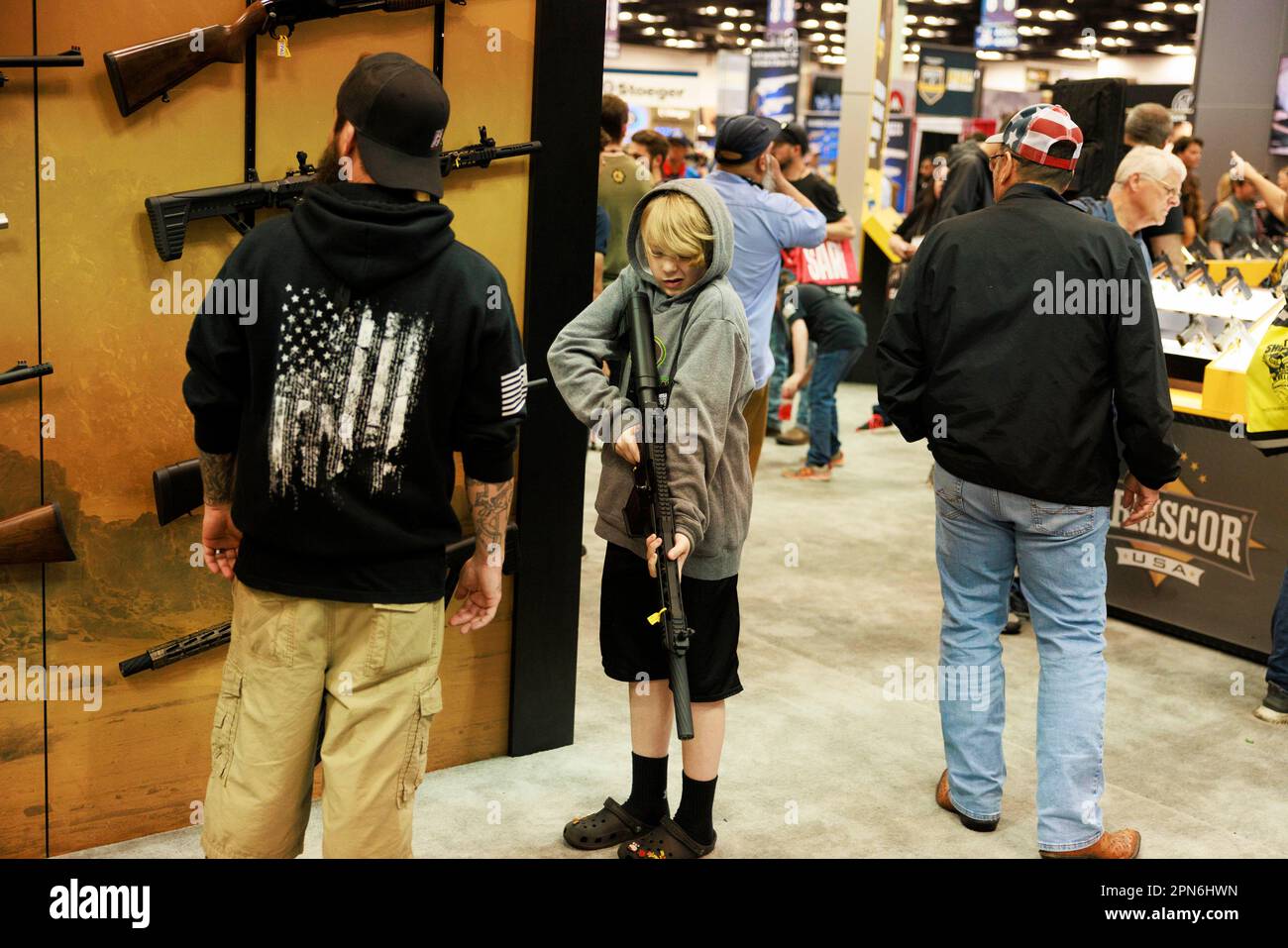 Indianapolis, United States. 16th Apr, 2023. A boy holds a rifle during ...