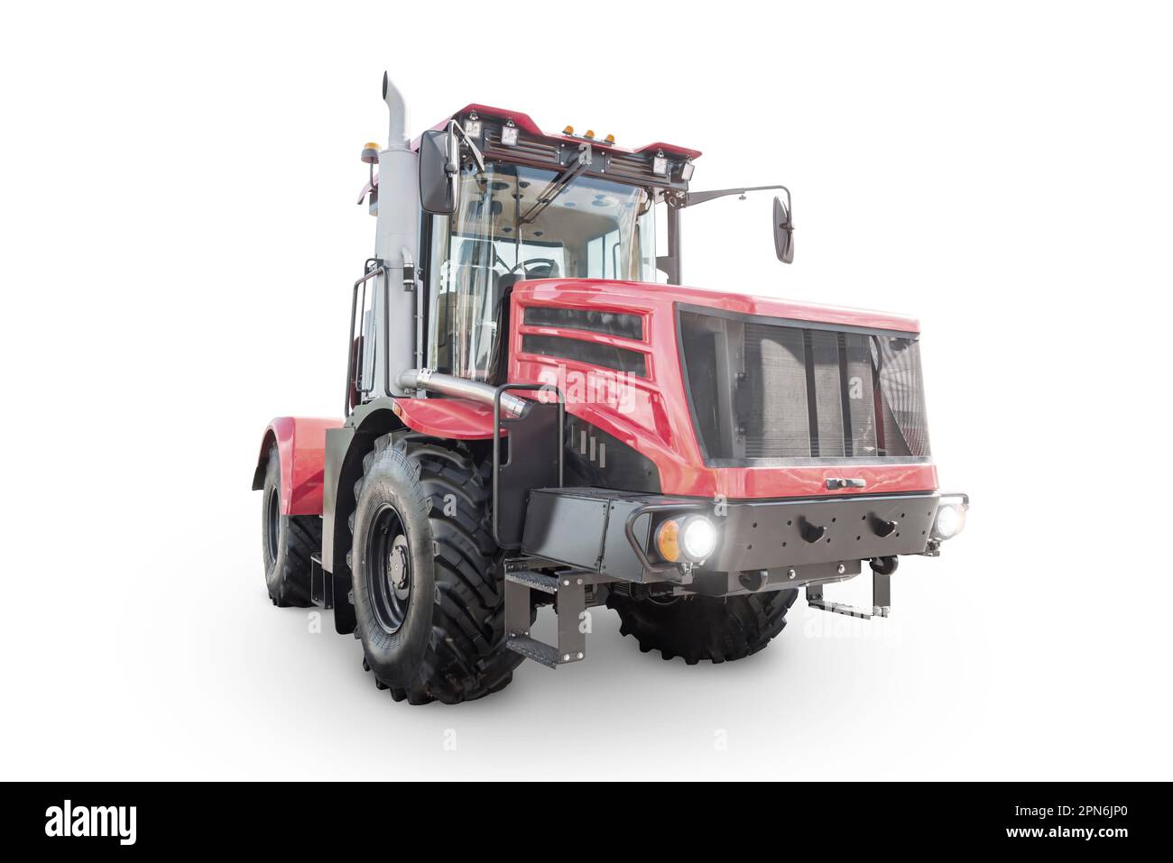 Red heavy wheeled tractor isolated on white background Stock Photo - Alamy