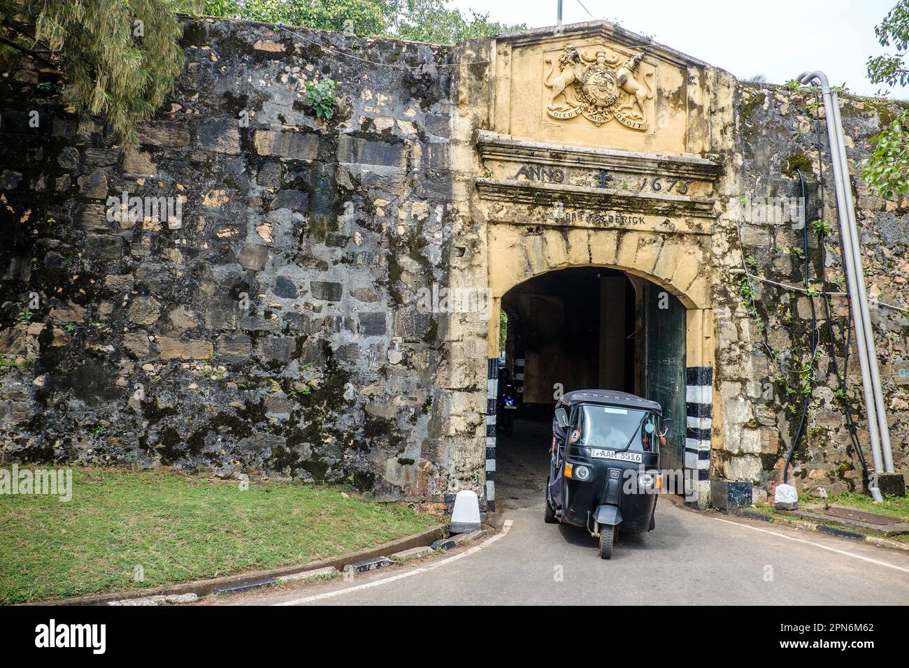 Tuk tuk emerging through main gate of Fort Frederick in Trincomalee ...