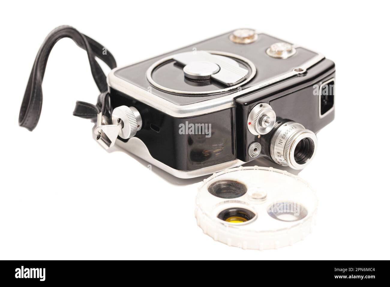 Vintage movie camera isolated on white Stock Photo - Alamy