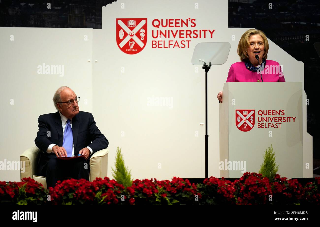 Hillary Clinton, watched by George Mitchell, speaking during the three ...