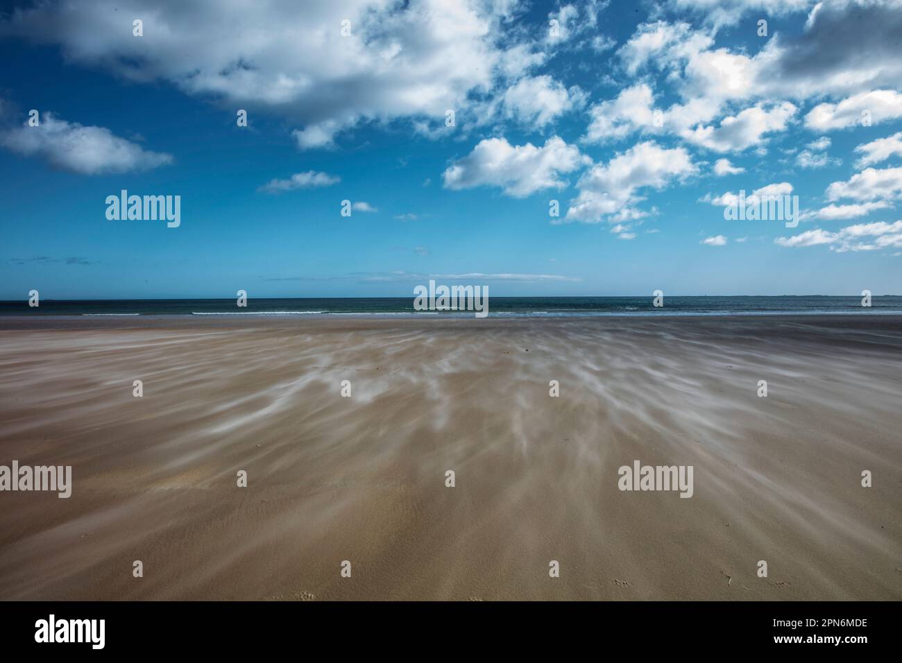 Strong winds blowing sand around on the Beach Stock Photo - Alamy
