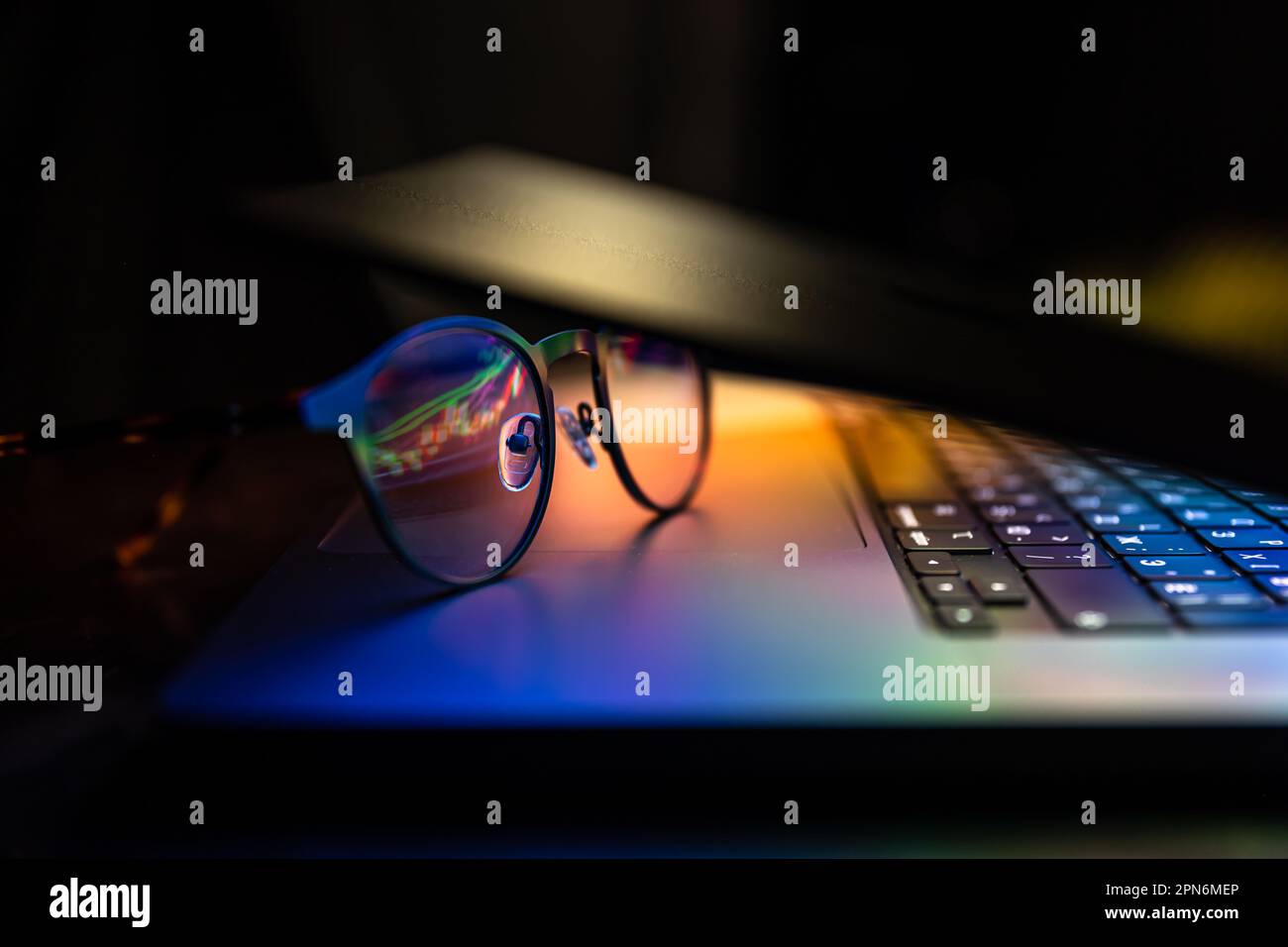 Laptop half closed in hi-res stock photography and images - Alamy