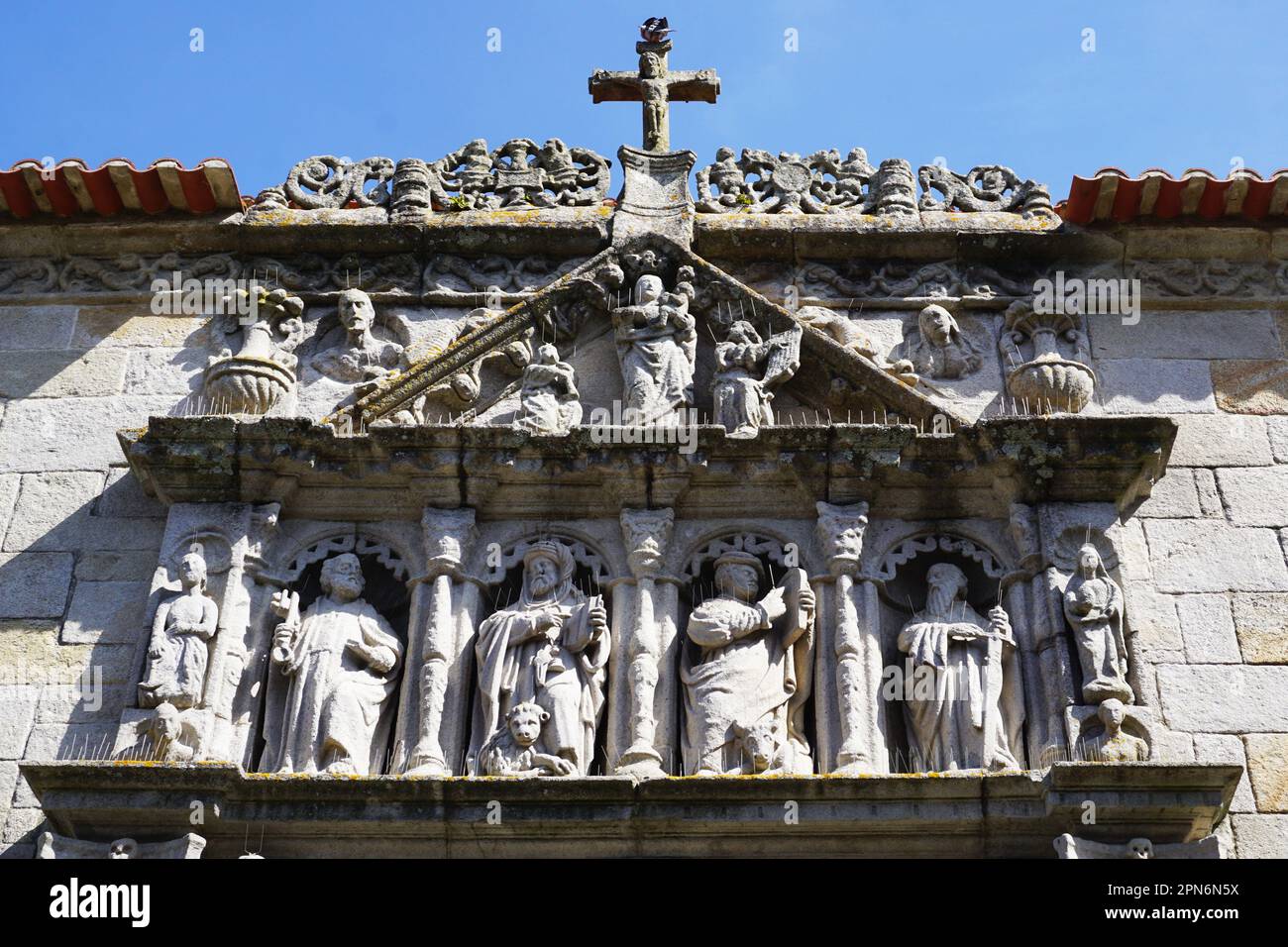 Stone sculptures of saints on the facade of the Church of Caminha in ...