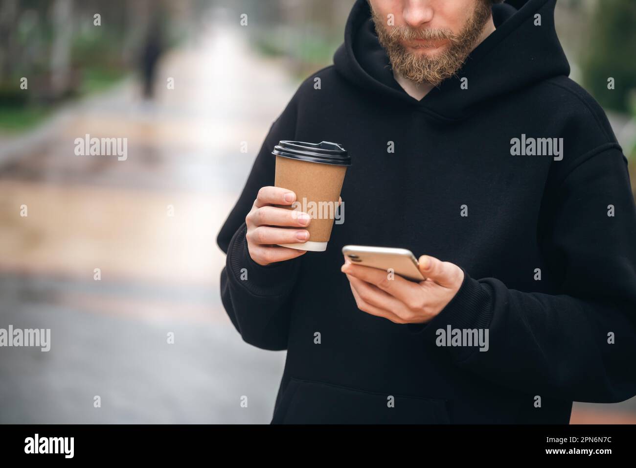 Smiling businessman paper cup walking hi-res stock photography and ...