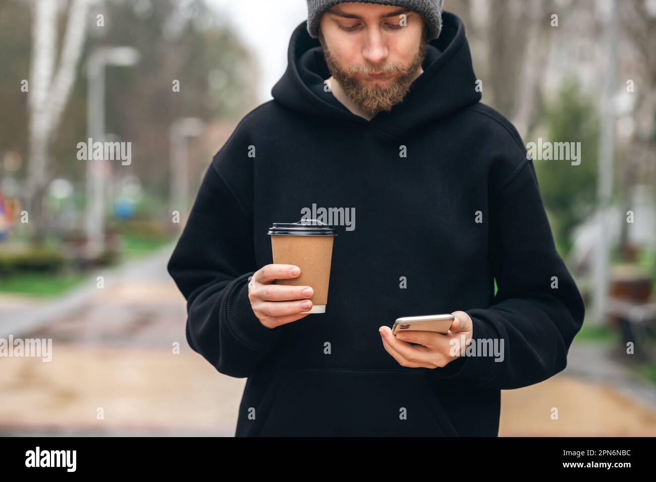 Smiling businessman paper cup walking hi-res stock photography and ...