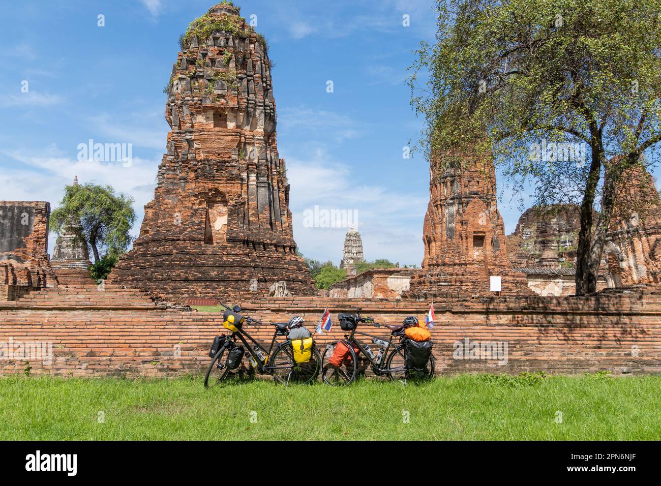 two touring bikes loaded with bags at Bueng Phra Ram Park temple Stock ...