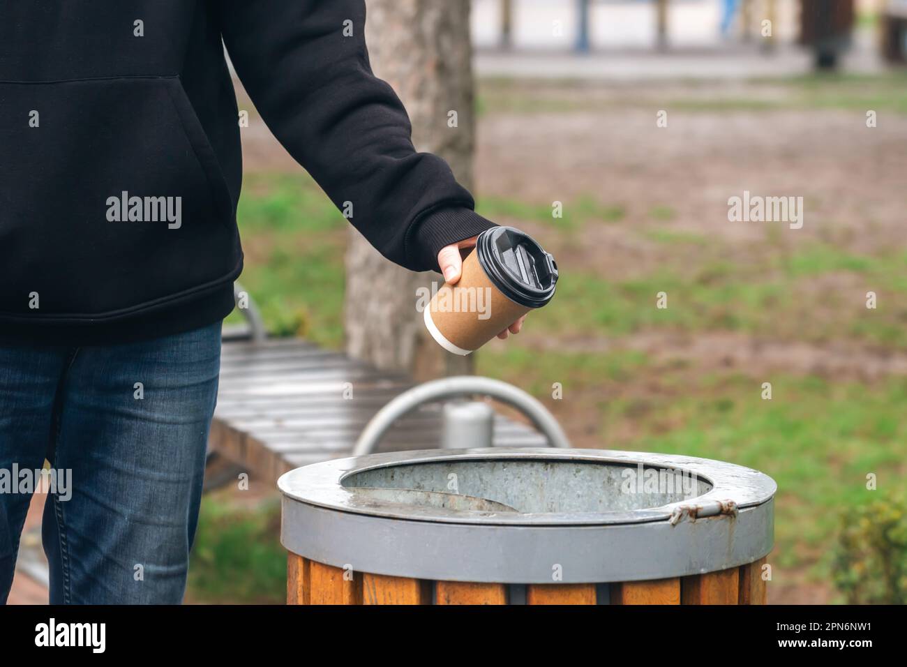 Man throws garbage street trash hi-res stock photography and images - Alamy