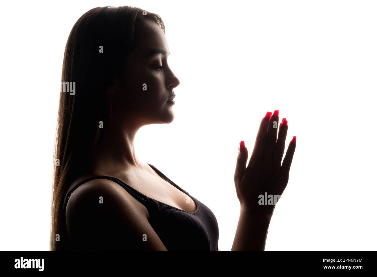 Prayer silhouette faith forgiveness backlit woman Stock Photo - Alamy