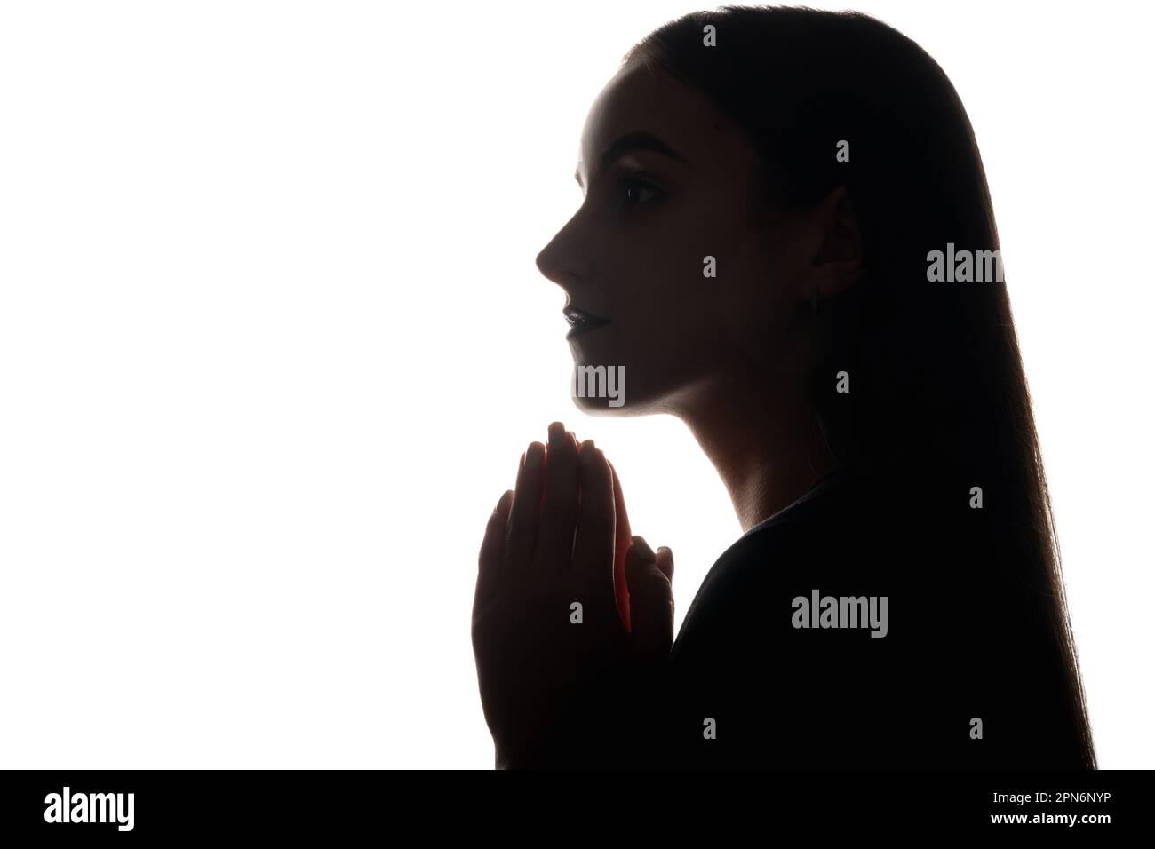 Prayer silhouette spiritual belief profile hi-res stock photography and ...