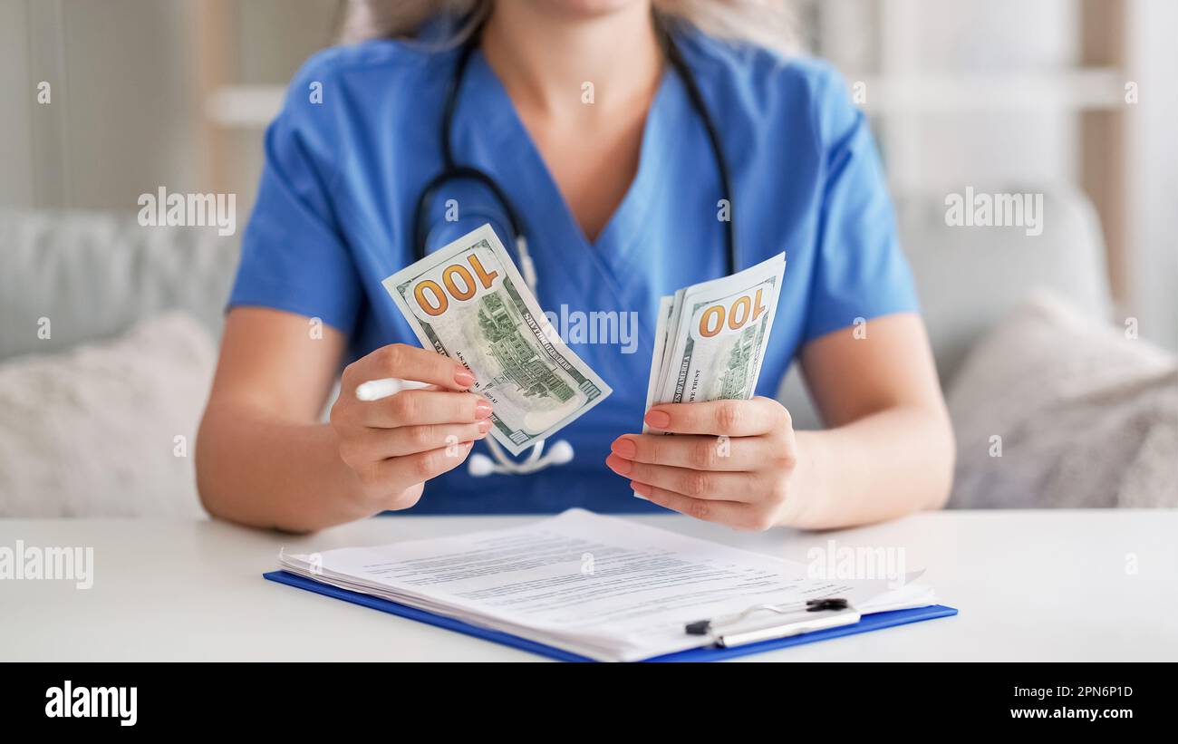Hospital account doctor money dollars cash record Stock Photo - Alamy