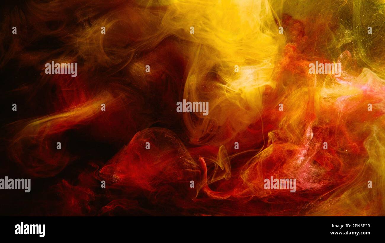 Color smoke paint water mix fire flame red yellow Stock Photo - Alamy