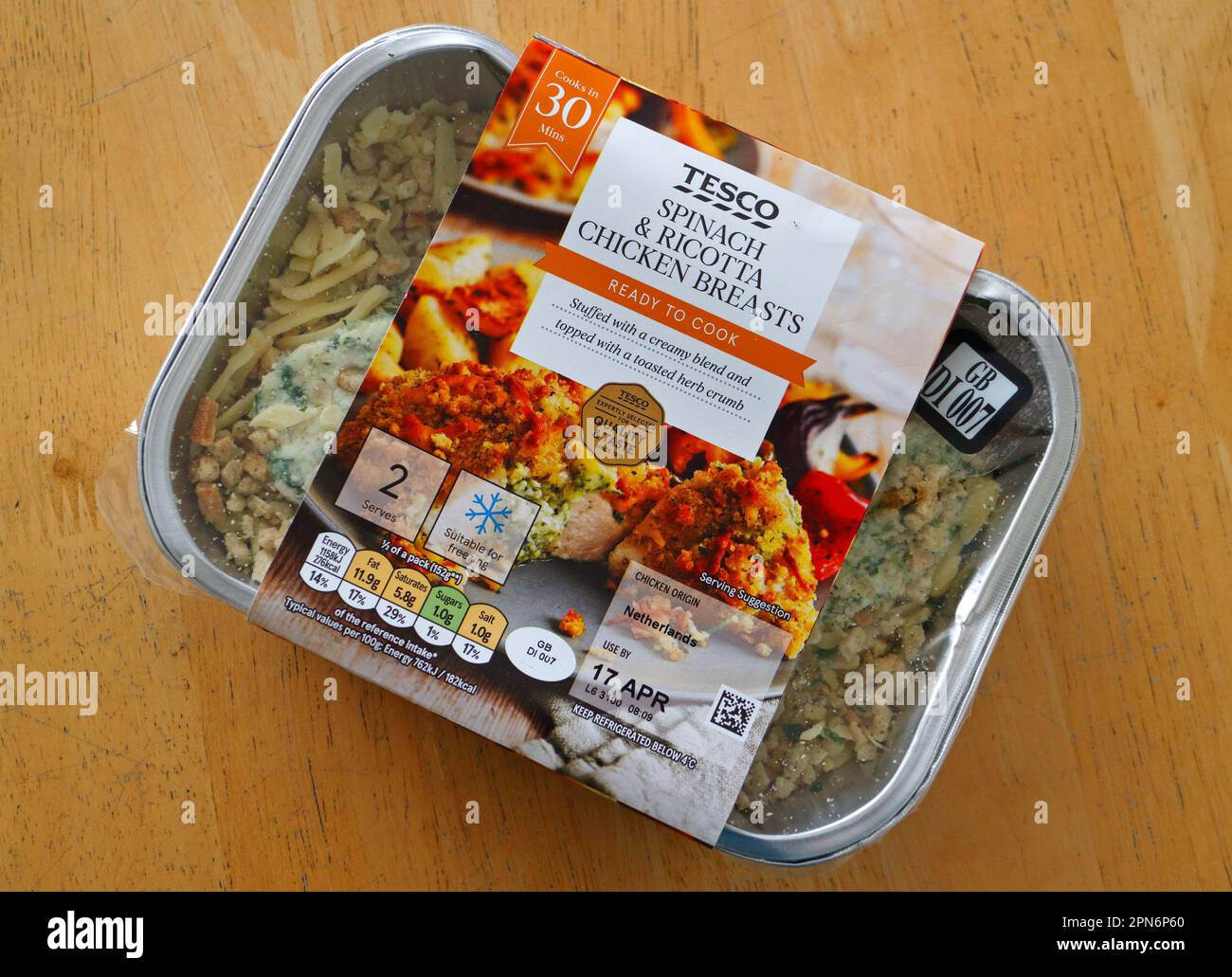 A ready meal of Tesco Spinach and Ricotta Chicken Breasts on a kitchen ...